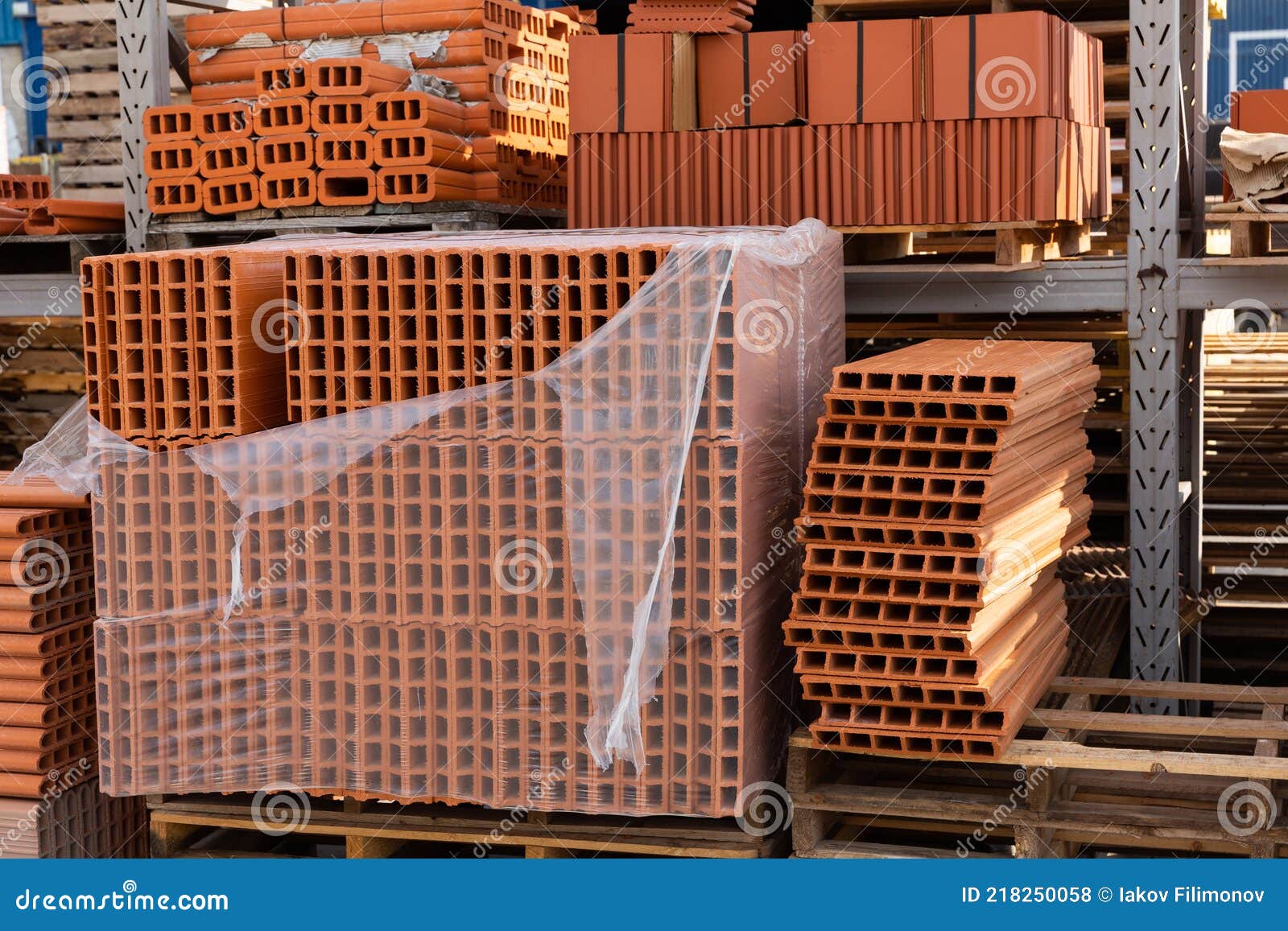 Pallets with Stack of Redbricks Lying at Warehouse Stock Photo - Image ...