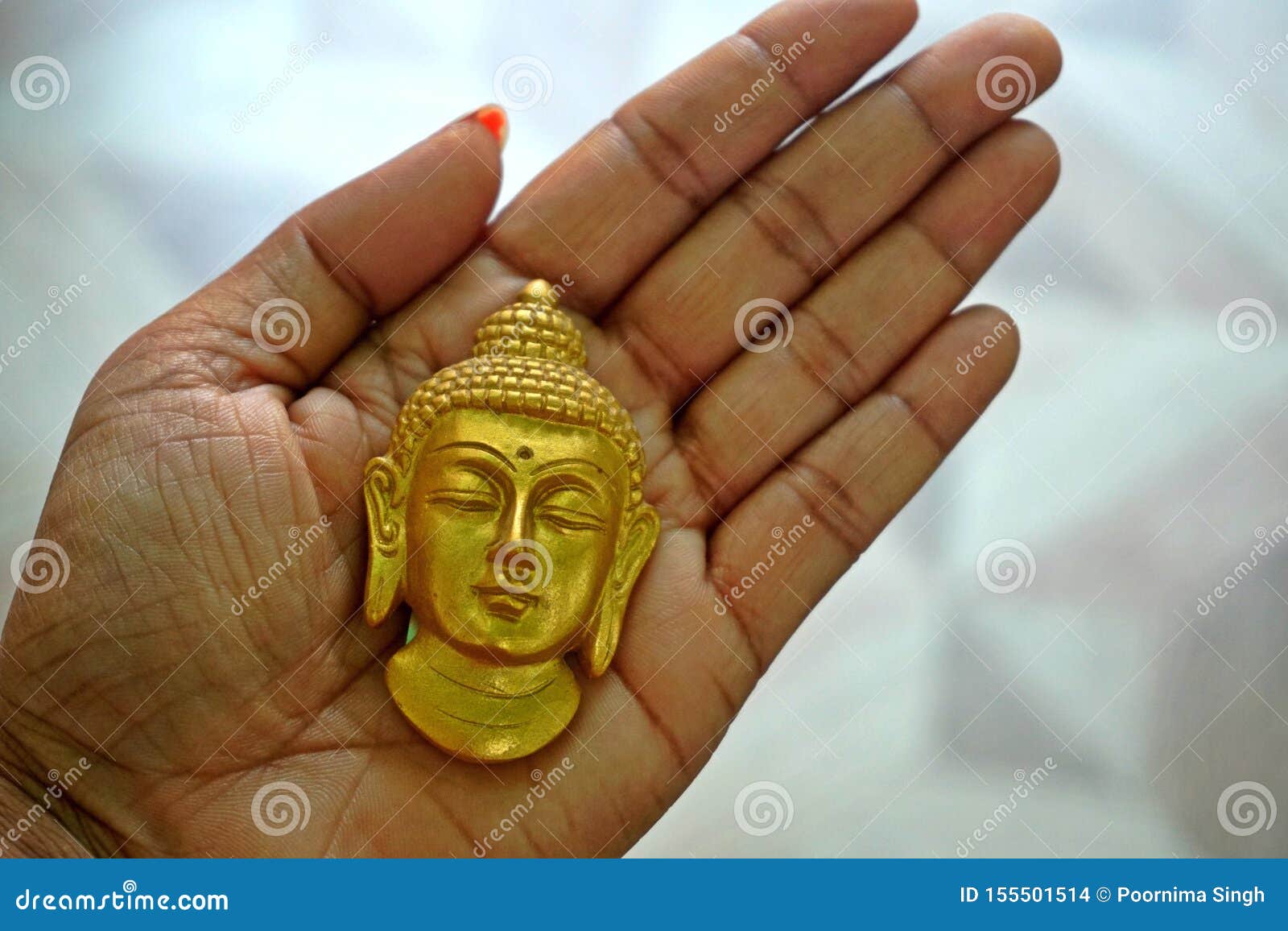 On the Palm of the Hand is a Golden Buddha Face Stock Photo - Image of ...