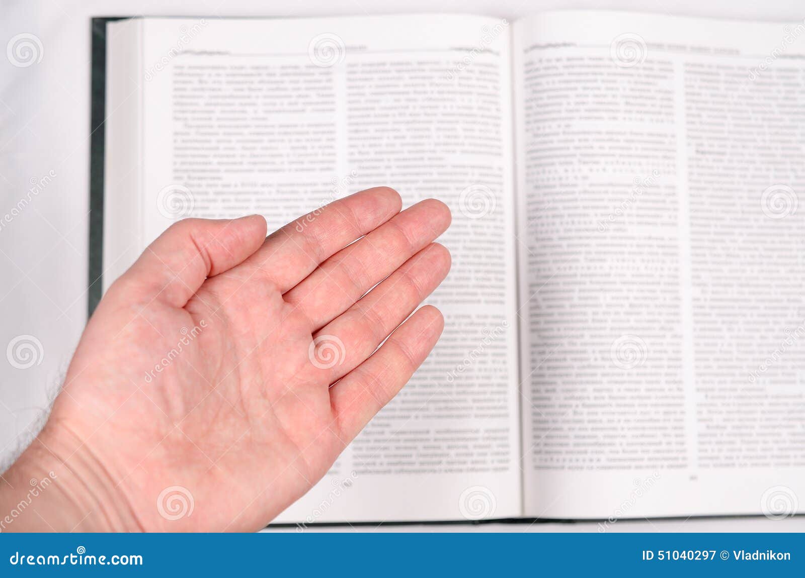 Palm shows an open book. stock image. Image of literary - 51040297