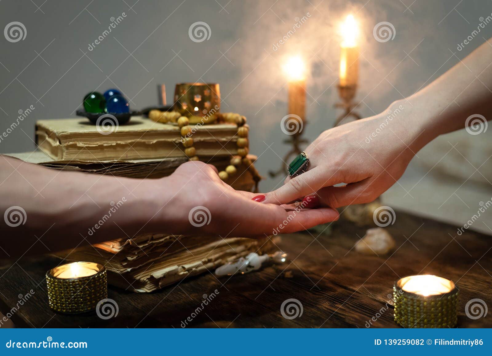 Palmist. stock photo. Image of concept, dark, book, holding - 139259082