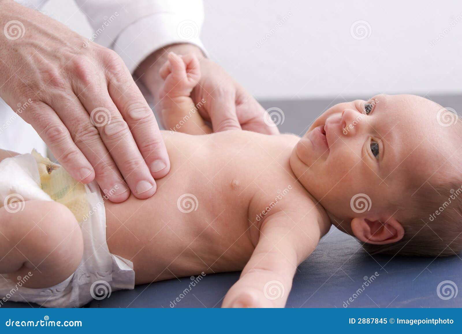 Palpating baby stock image. Image of exam, neonate, doctor - 2887845
