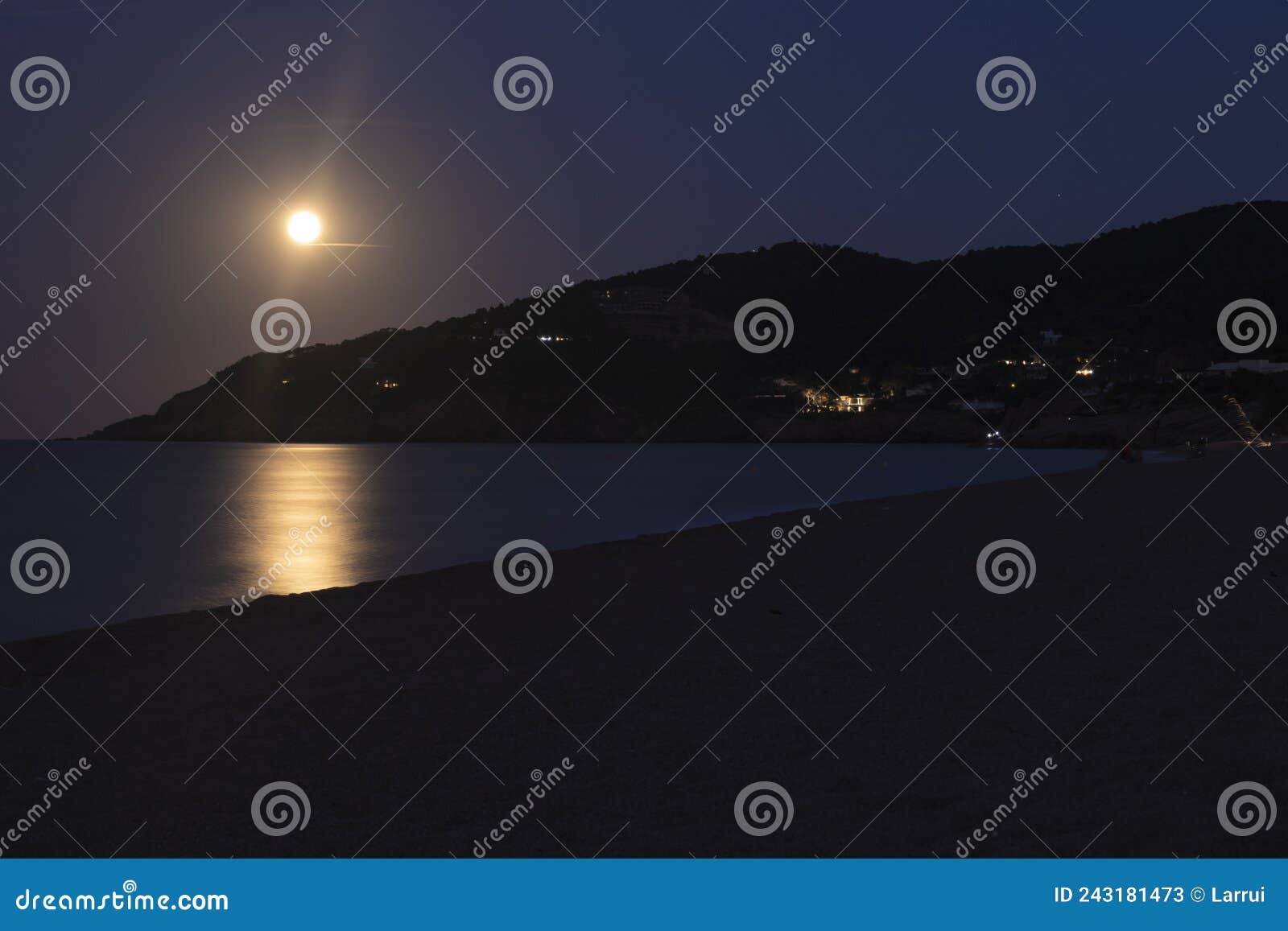 Beach at Night with the Full Moon Rising Over the Horizon Stock Image ...