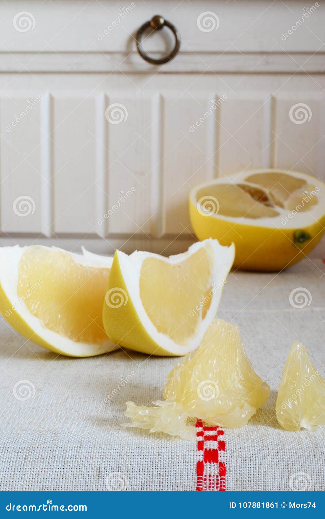 Pamela Fruit, Cut into Pieces, on a White Background Stock Image ...