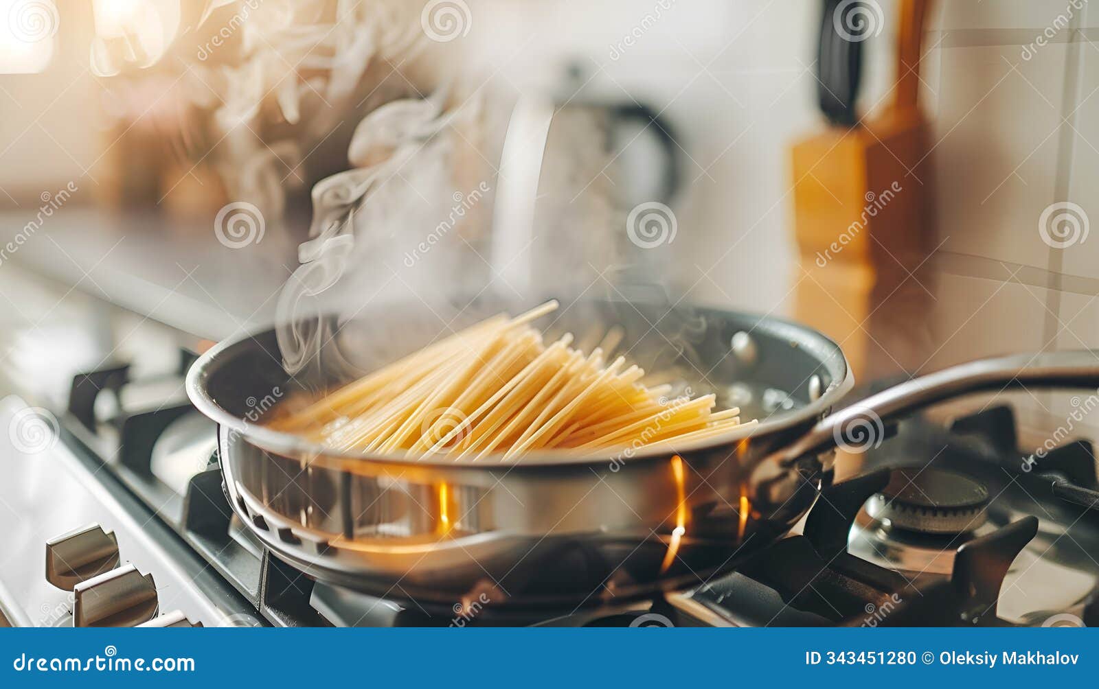 Pan of Boiling Water with Spaghetti on the Cooker in the Kitchen Stock ...