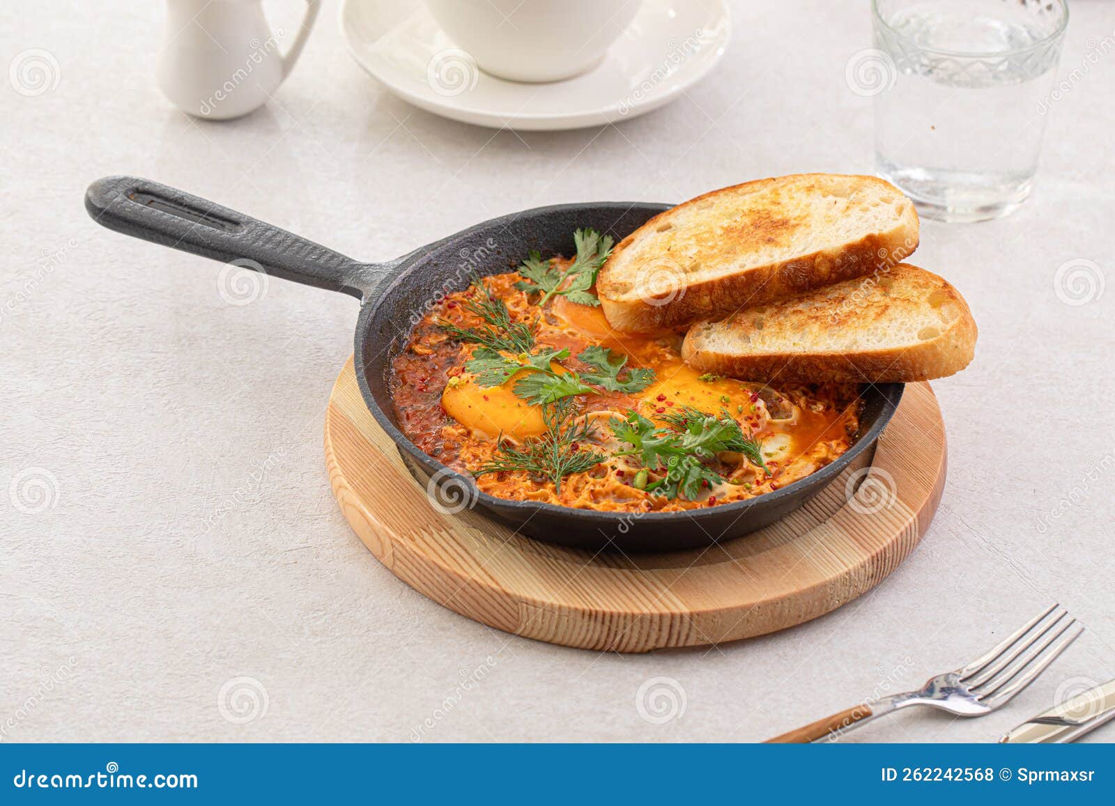 Pan of Shakshuka Middle Eastern Dish with Bread Stock Photo - Image of ...