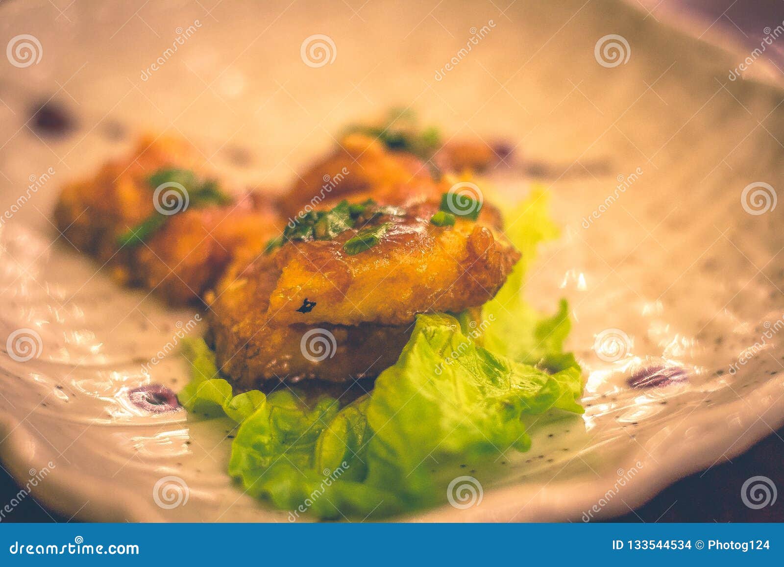 Pan Fried Cod Fish with a LETTUCE LEAF Stock Photo - Image of entree ...