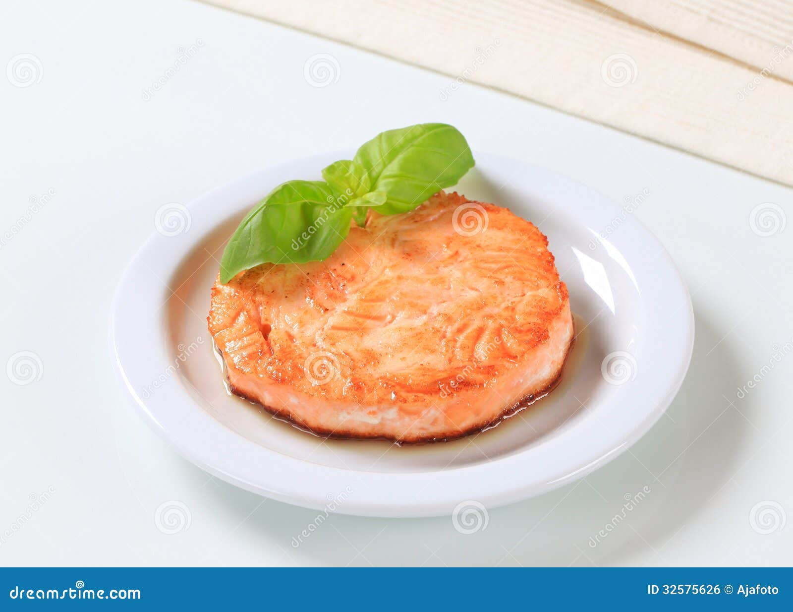 Pan-fried fish patty stock photo. Image of entree, plate - 32575626