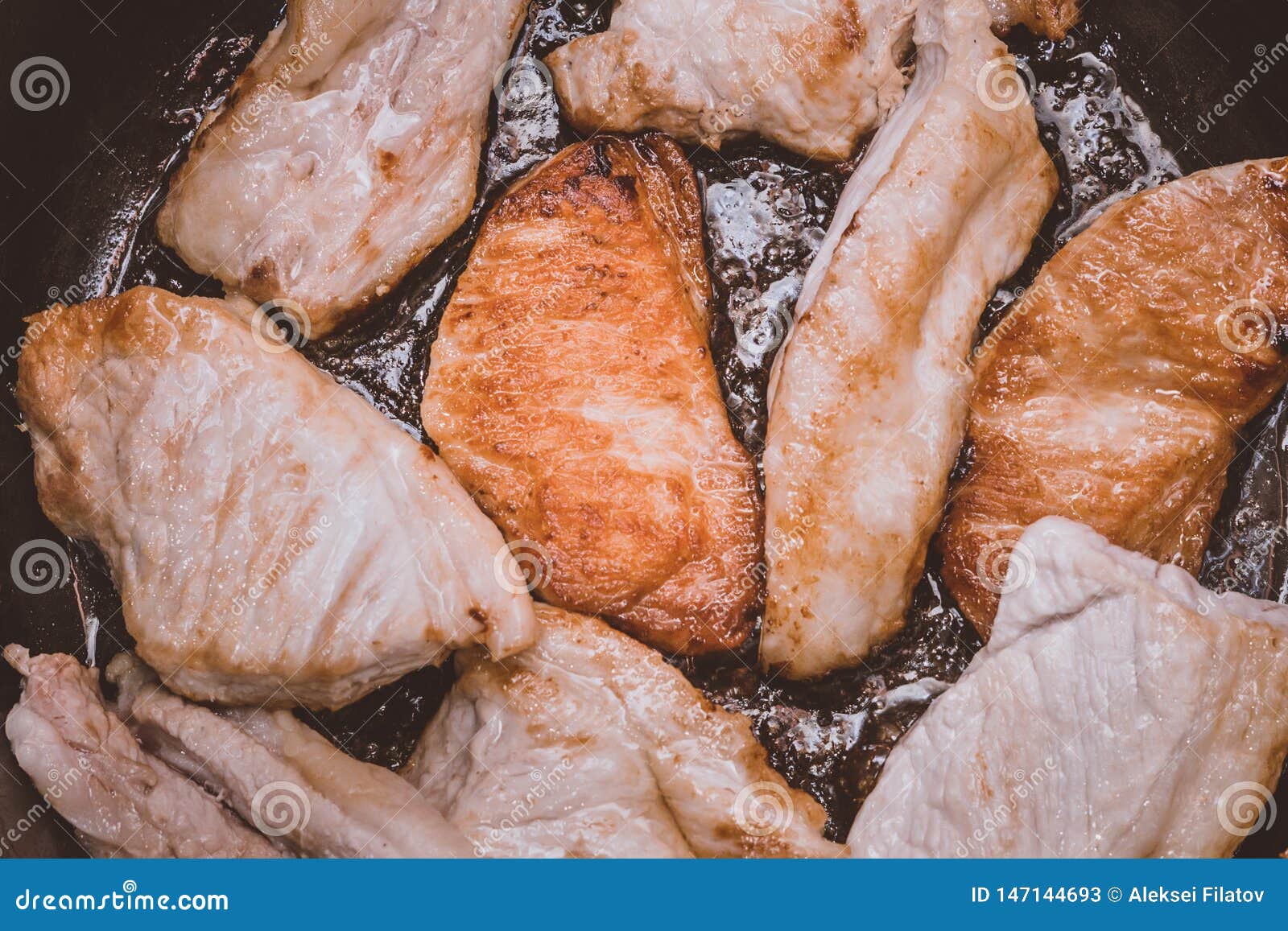 Pan fried meat top view stock image. Image of frying - 147144693