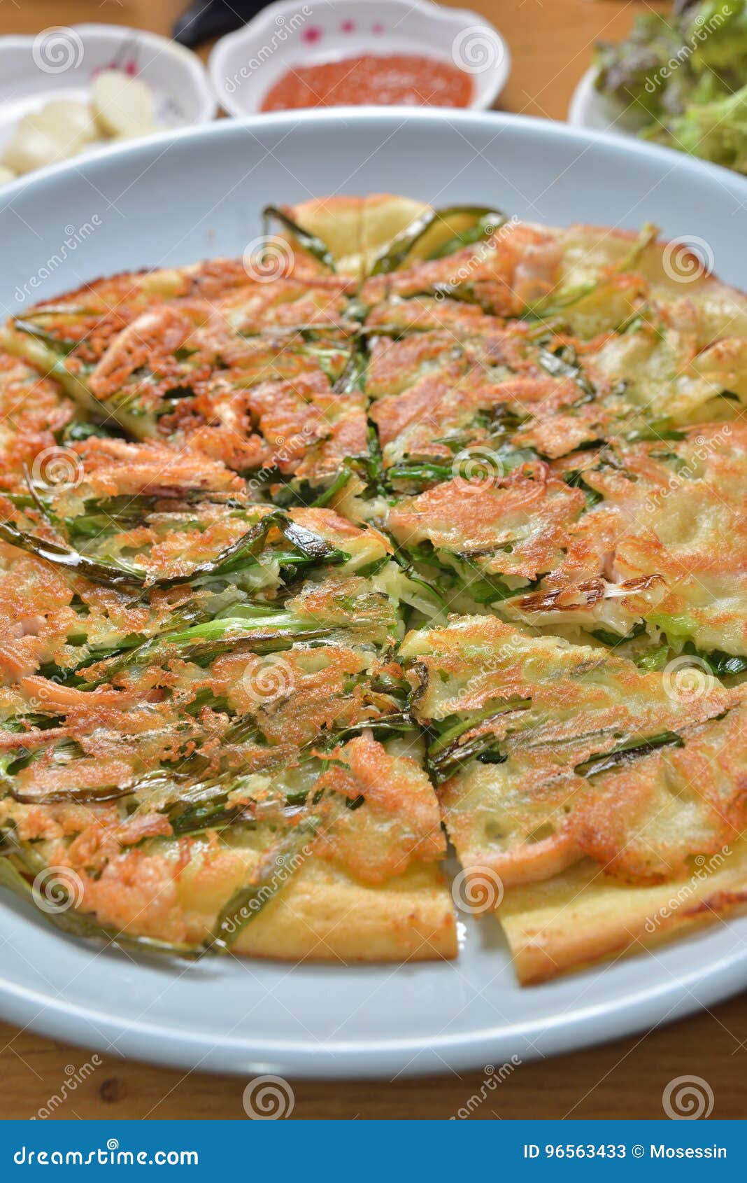 Pan-fried onion cake stock image. Image of sauce, steam - 96563433