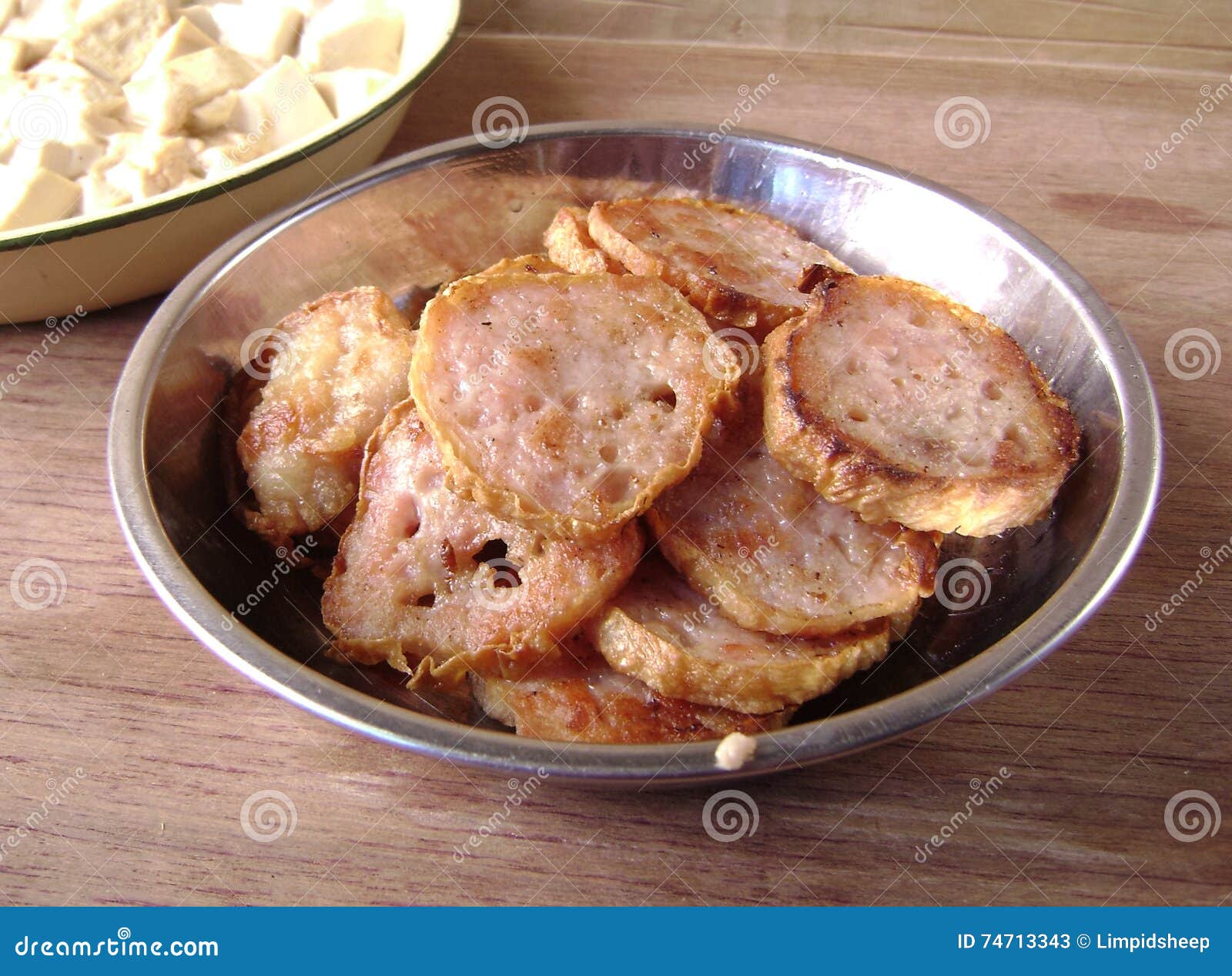 Pan-fried pork roll slices stock image. Image of wood - 74713343