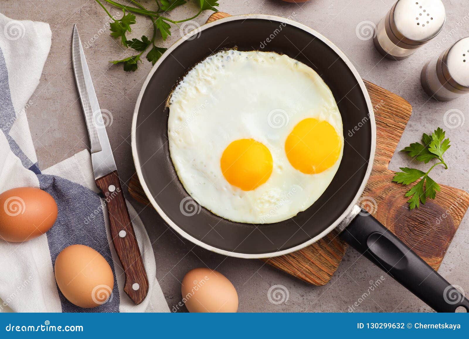 Pan with Fried Sunny Side Up Eggs Served on Table Stock Photo - Image ...