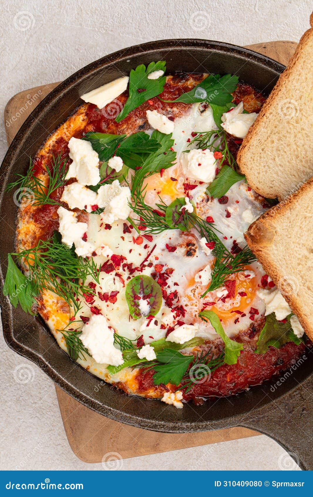 Pan of Middle Eastern Dish Shakshuka with Toasts Stock Photo - Image of ...