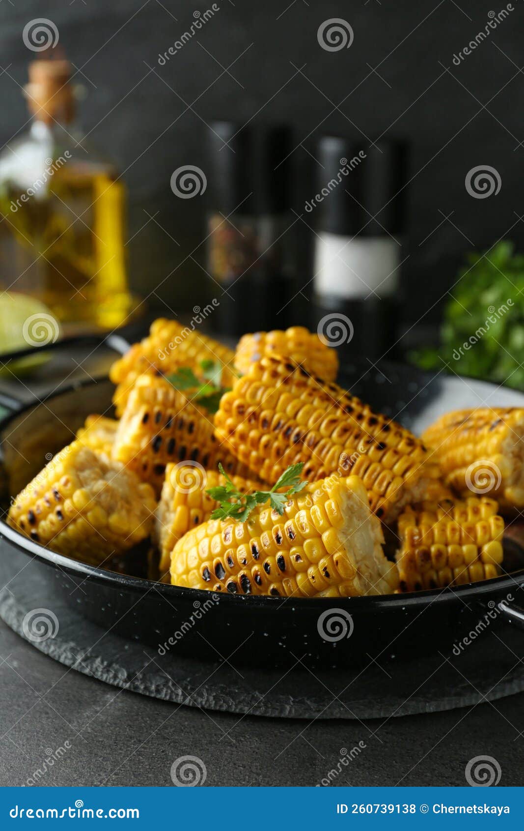 Pan with Tasty Grilled Corn on Dark Grey Table Stock Photo - Image of ...