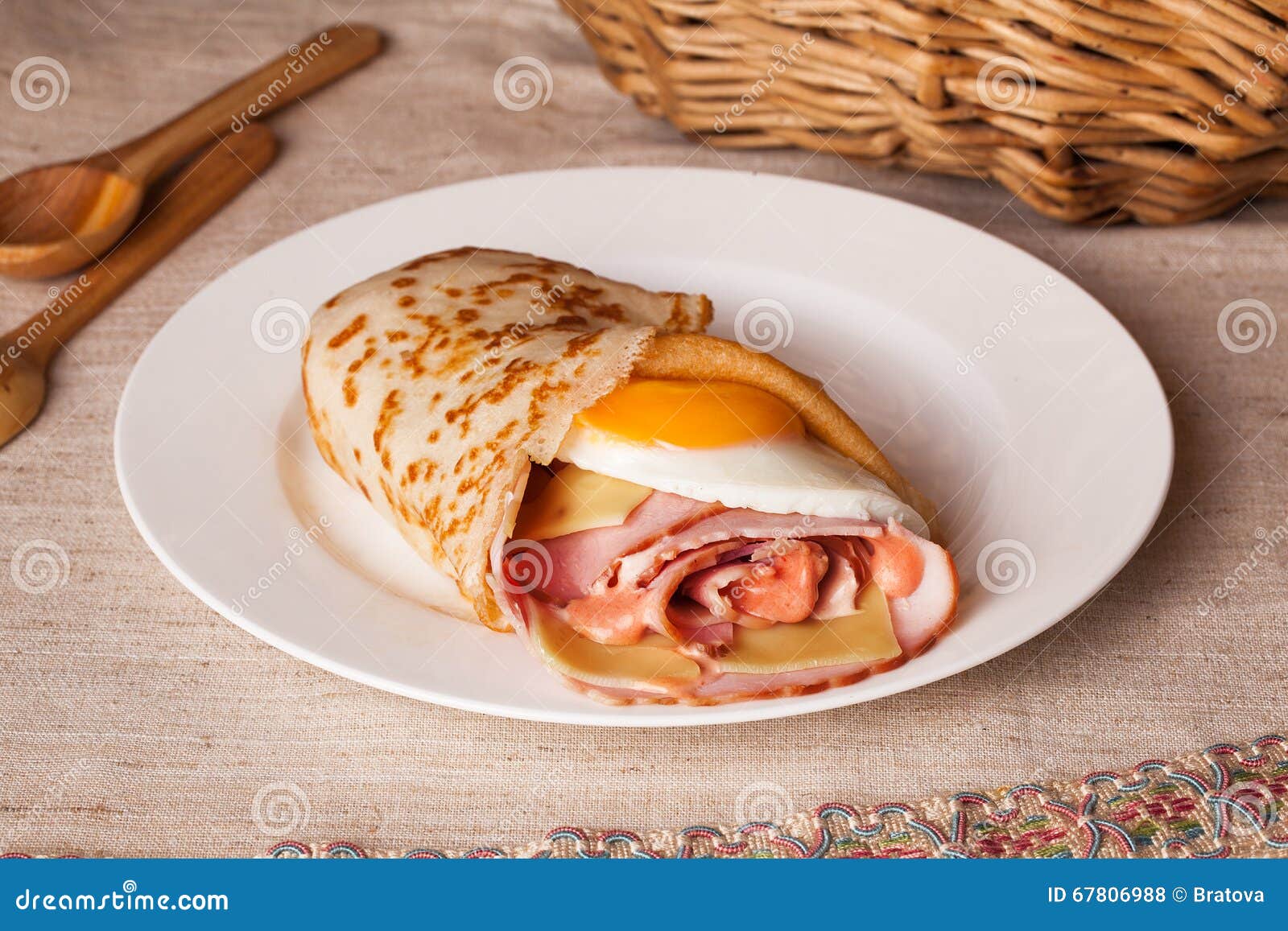 Pancake Breakfast with Ham and Egg in a Rustic Still Life Stock Photo ...