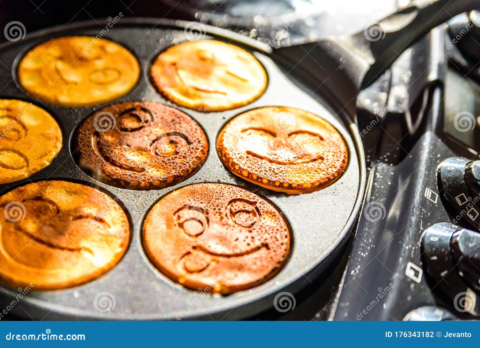 Pancake Frying Pan with Smile Face Pancake Cooking on Cooker in Kitchen ...