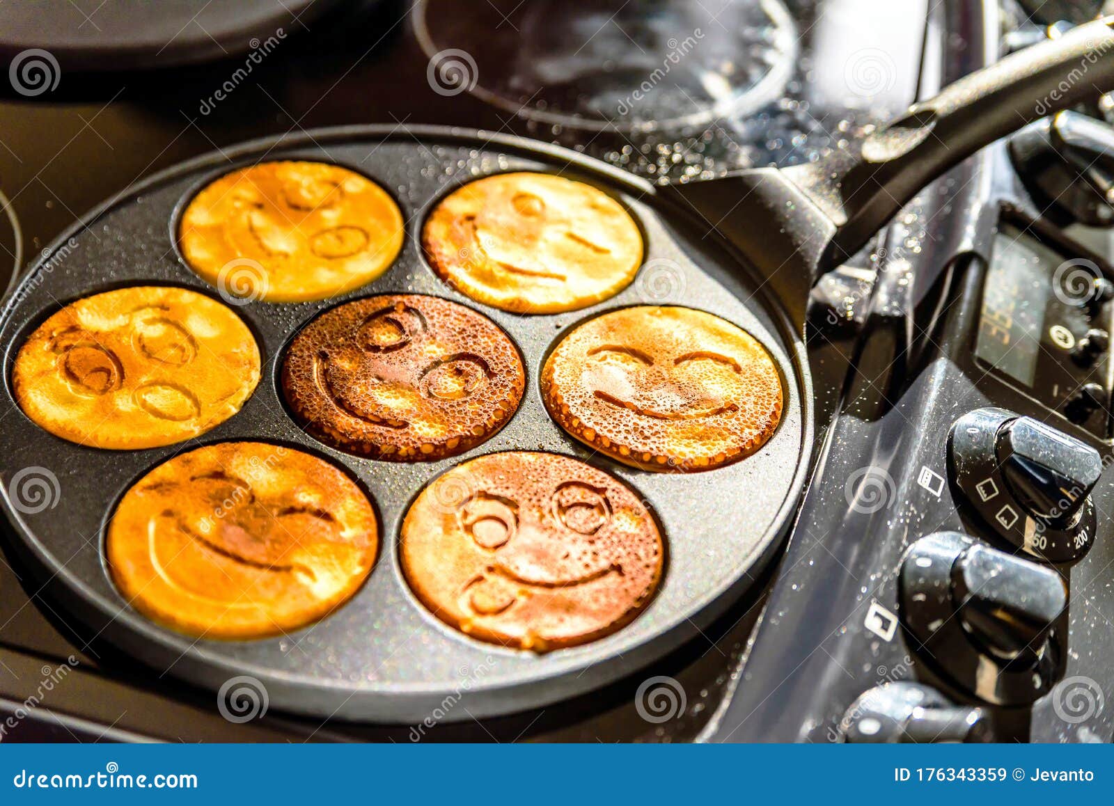 Pancake Frying Pan with Smile Face Pancake Cooking on Cooker in Kitchen ...