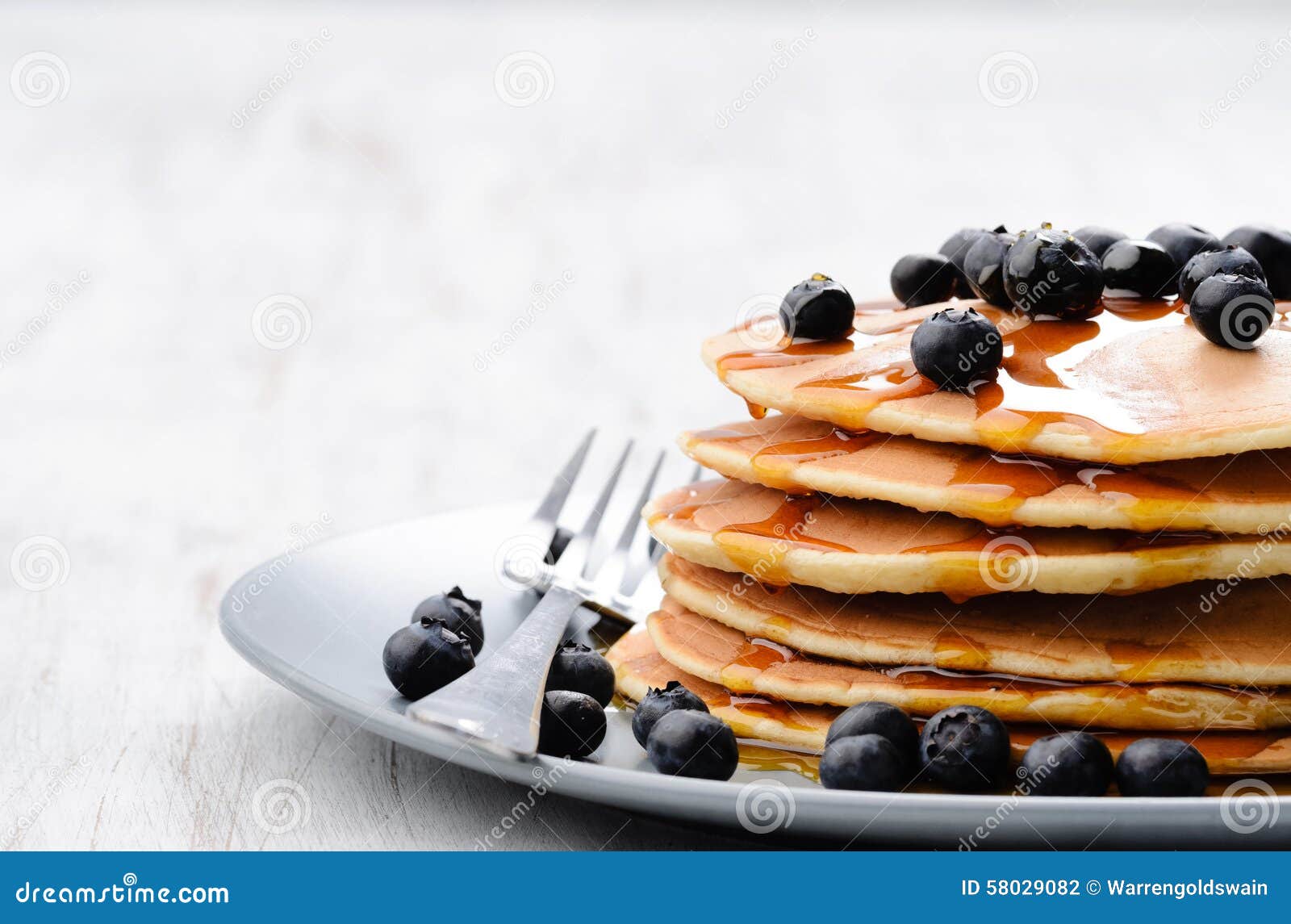Pancake stack with syrup stock photo. Image of space - 58029082