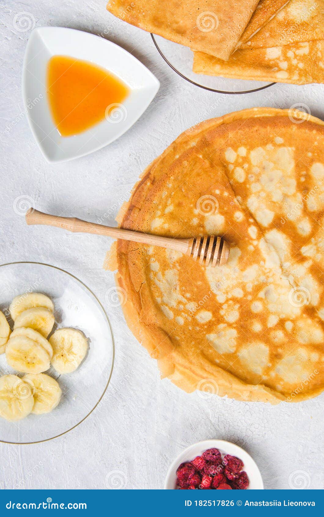 Pancakes with Berries and Honey for Breakfast on White Table Stock ...