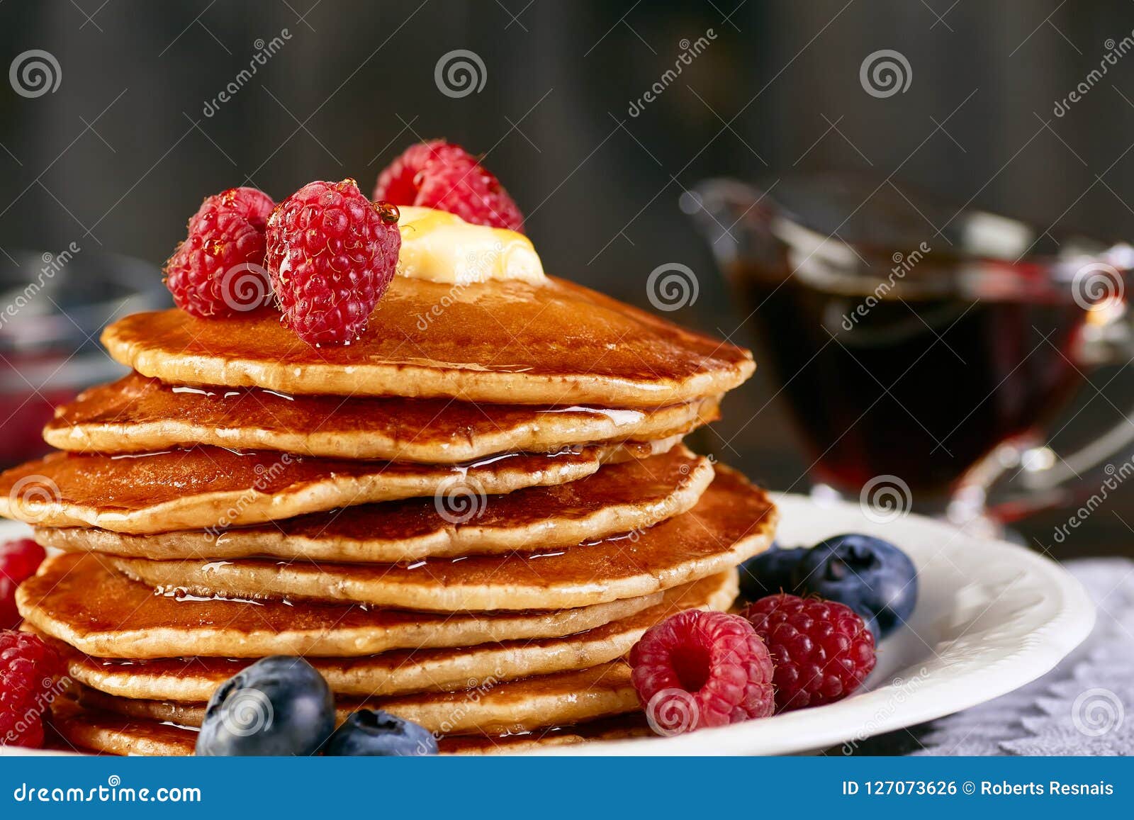 Stack of Pancakes with Berries and Maple Syrup Stock Photo - Image of ...