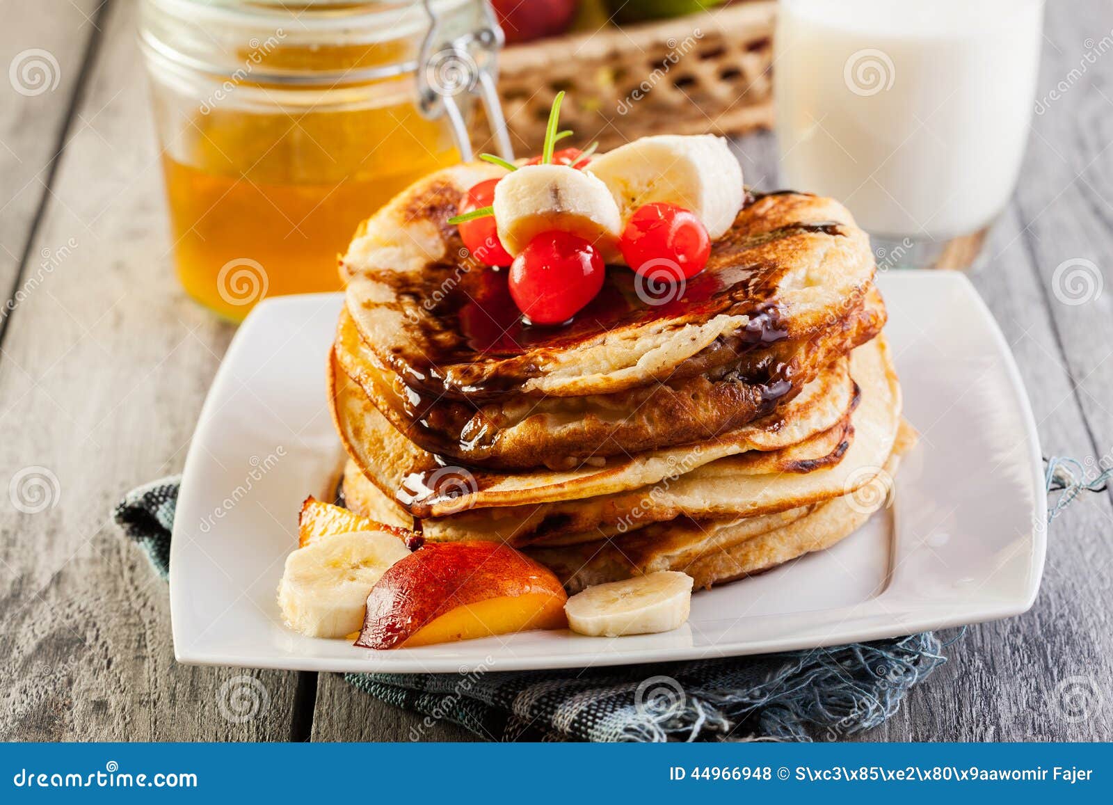 Pancakes with Chocolate Sauce Fruit and Glass of Milk Stock Photo ...