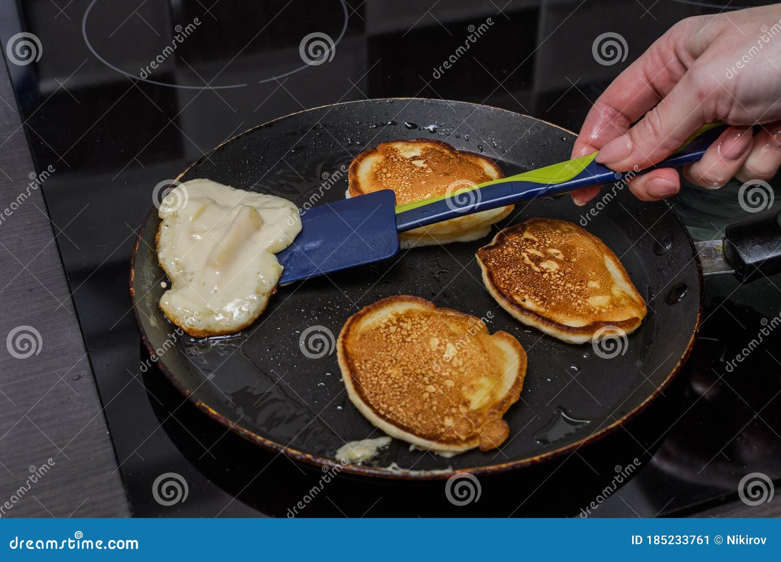 Pancakes are Fried in a Pan on an Induction Stove Stock Image - Image ...