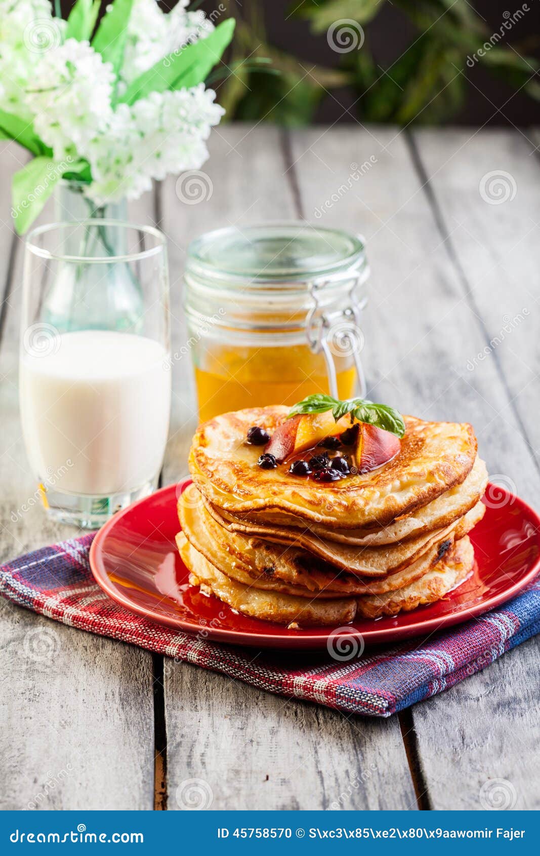 Pancakes with Honey, Fruit and Glass of Milk Stock Photo - Image of ...