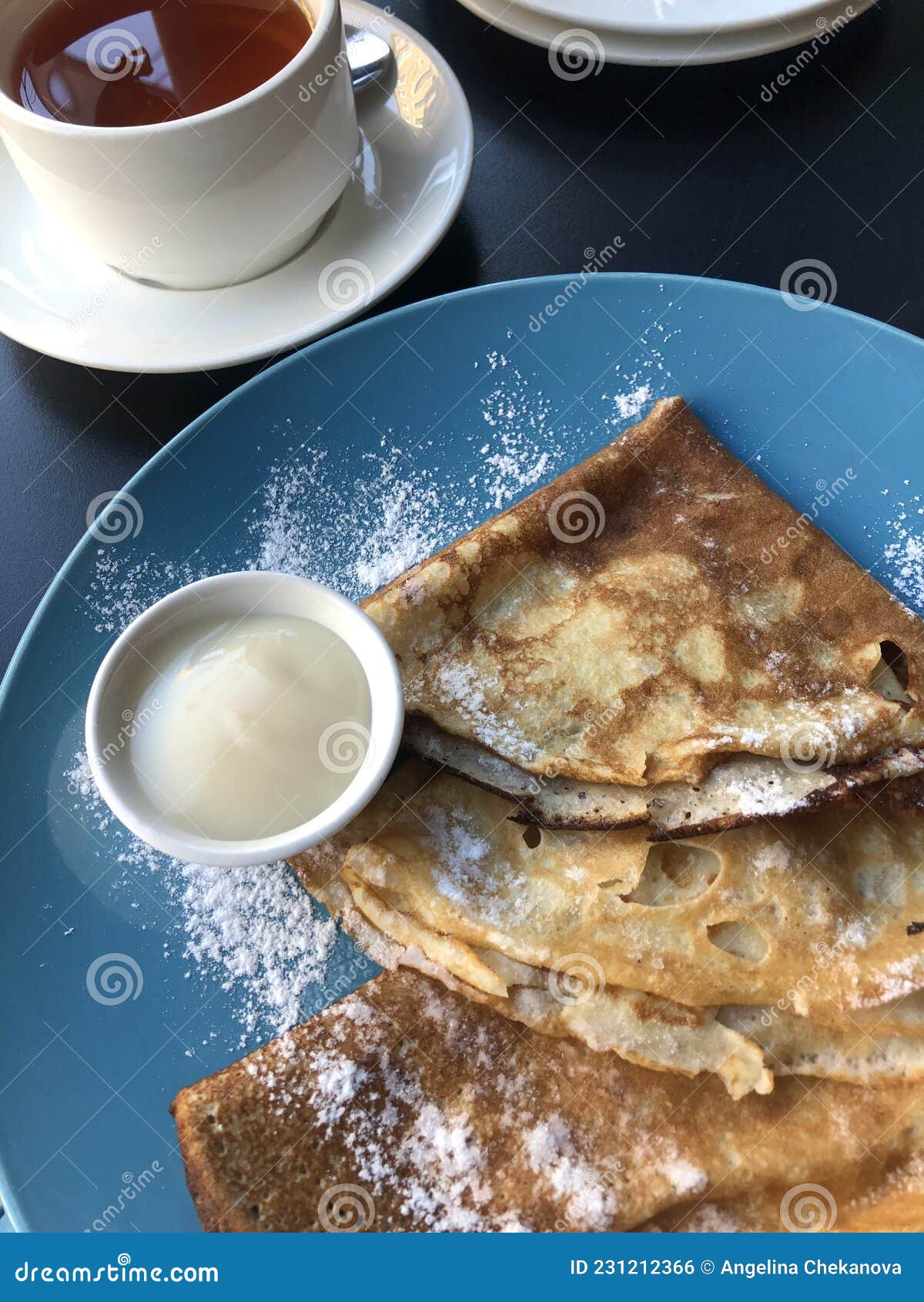 Pancakes with Powdered Sugar and Vanilla Cream Stock Photo - Image of ...