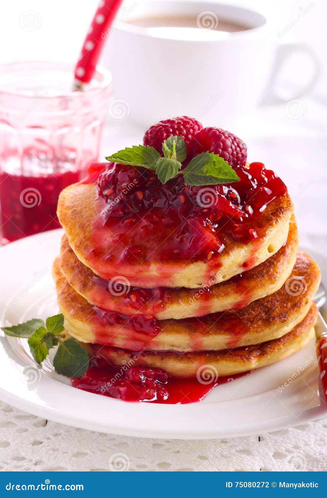 Pancakes with Raspberry and Peach Coulis Stock Photo - Image of treat ...