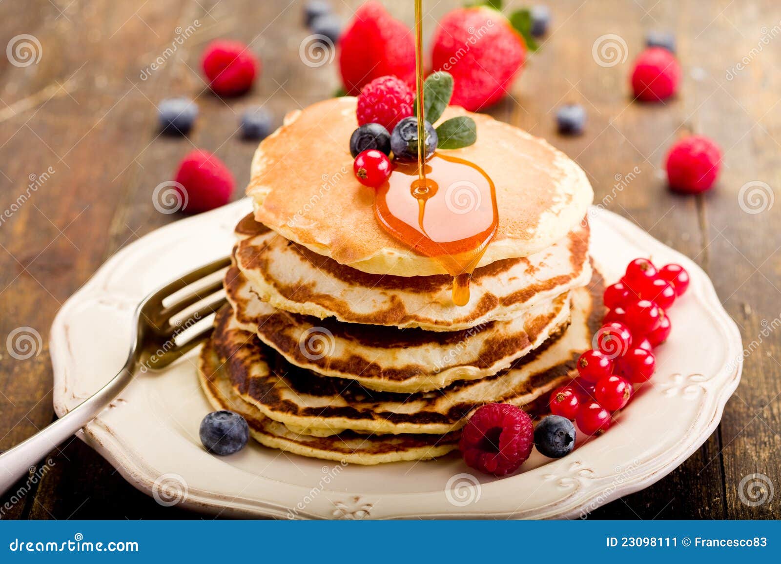 Pancakes on wooden table stock image. Image of energy - 23098111