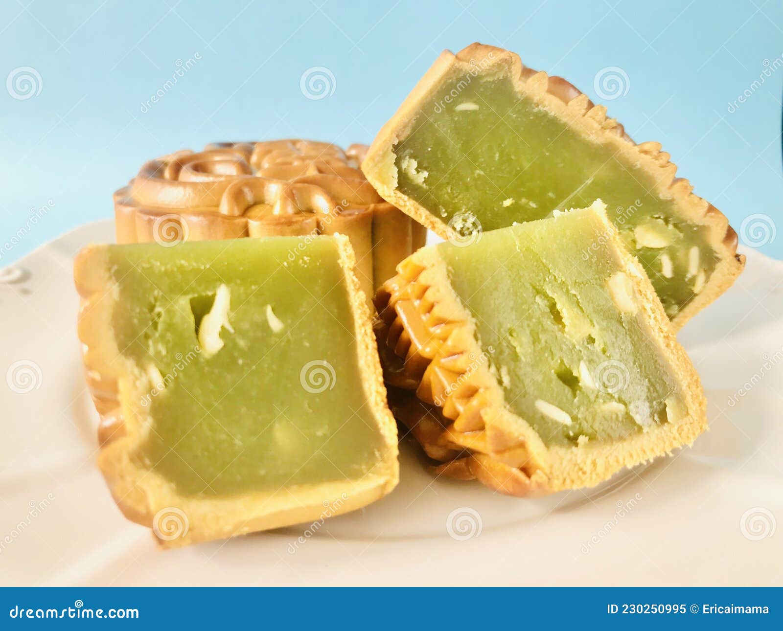 Pandan Seed Moon Cake Cut in Four Quarter, on a Blue Background. Stock ...