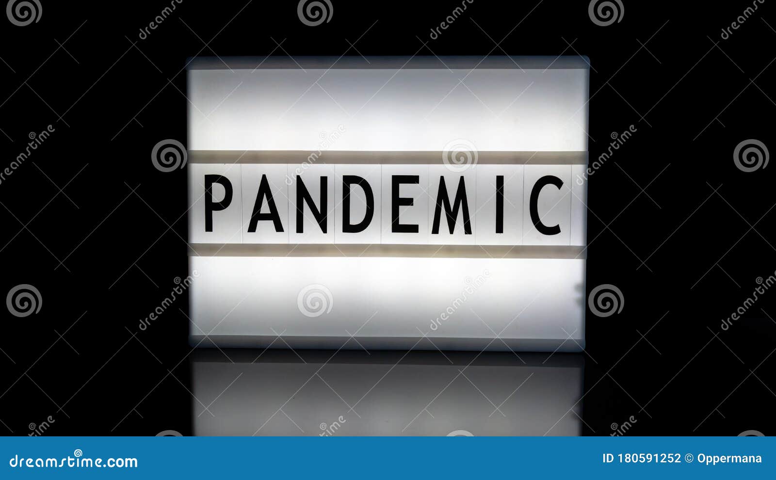 Pandemic Letters on a Light Box on Reflective Surface Stock Photo ...