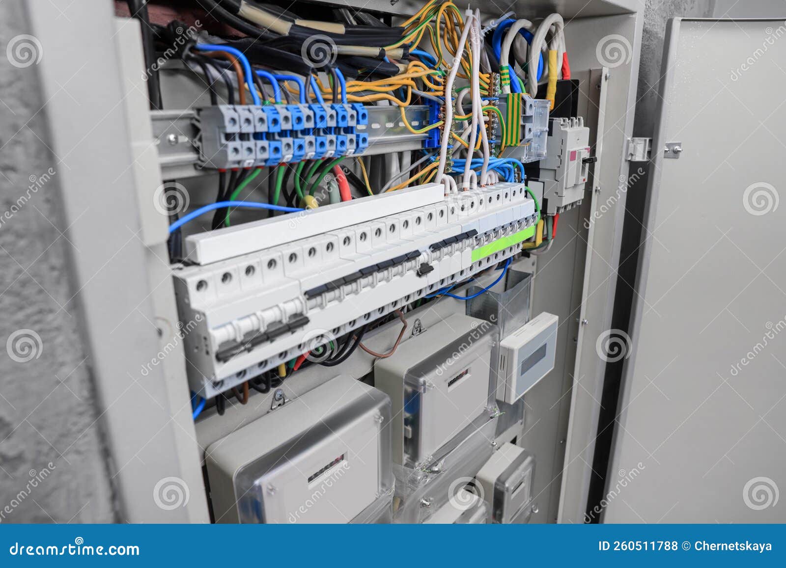 Panel with Electric Meters and Many Wires in Fuse Box Stock Photo ...