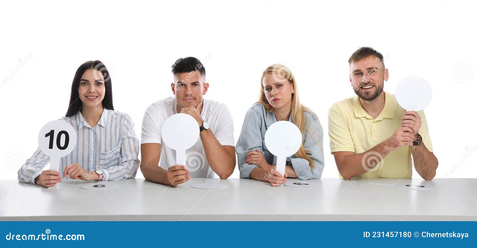 Panel of Judges with Different Emotions Holding Blank Signs at Table on ...