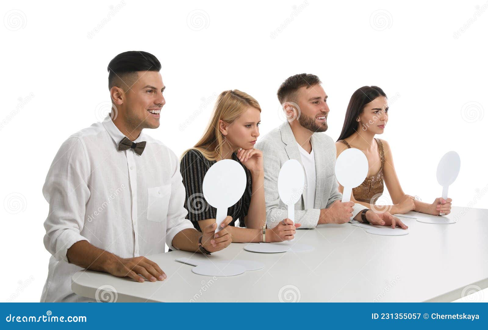 Panel of Judges with Different Emotions Holding Blank Signs at Table on ...