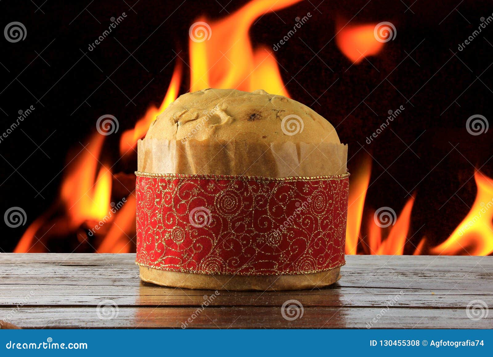 Panettone, Decorative Food, on Wooden Table, Fire in the Background ...