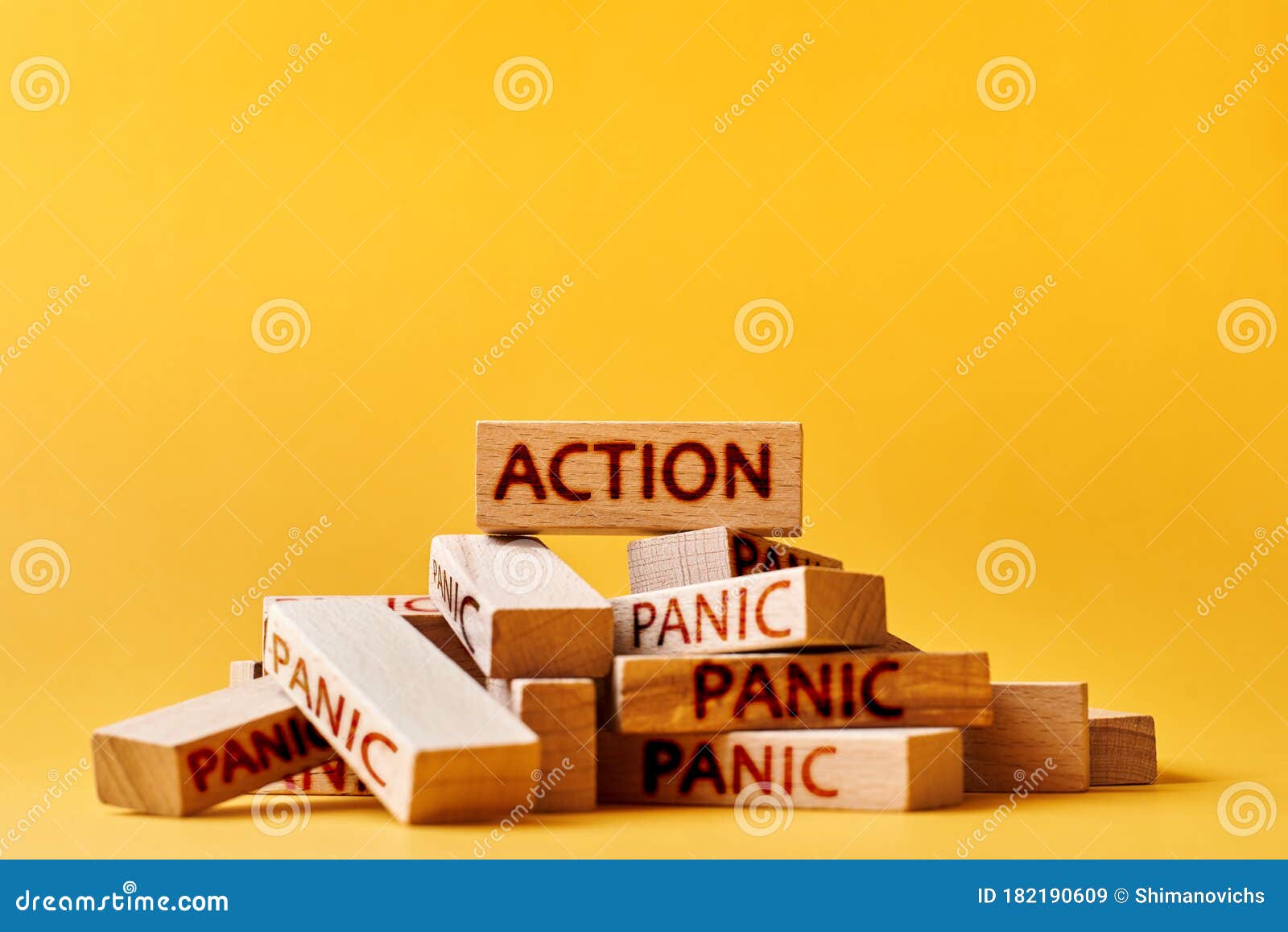Panic and Action Concept. Wooden Blocks with Inscriptions Stock Image ...