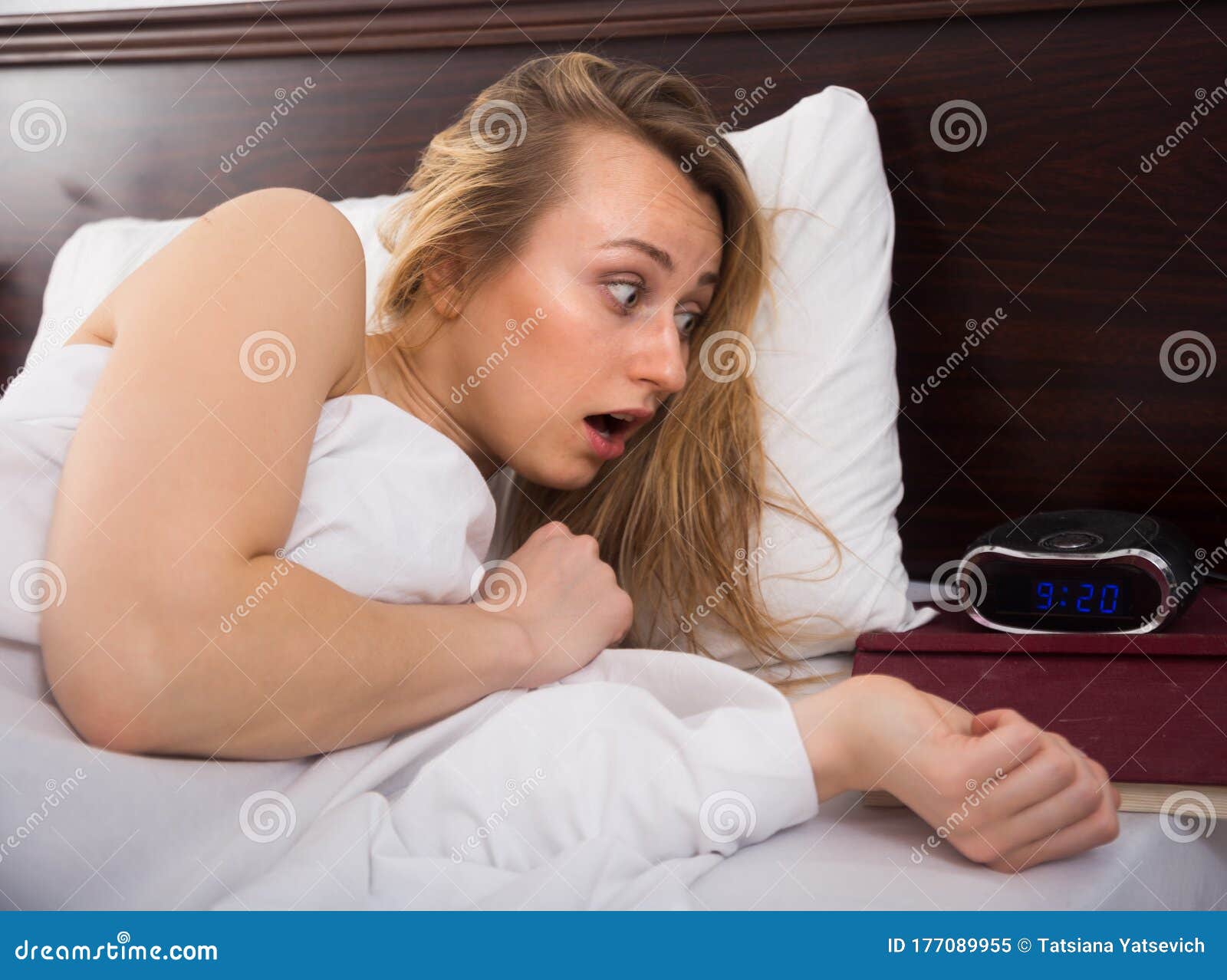 Woman in Panic Looks at Clock Stock Image - Image of indoors, girl ...