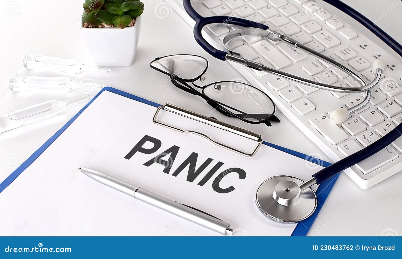 PANIC Text on White Paper on White Background. Stethoscope ,glasses and ...