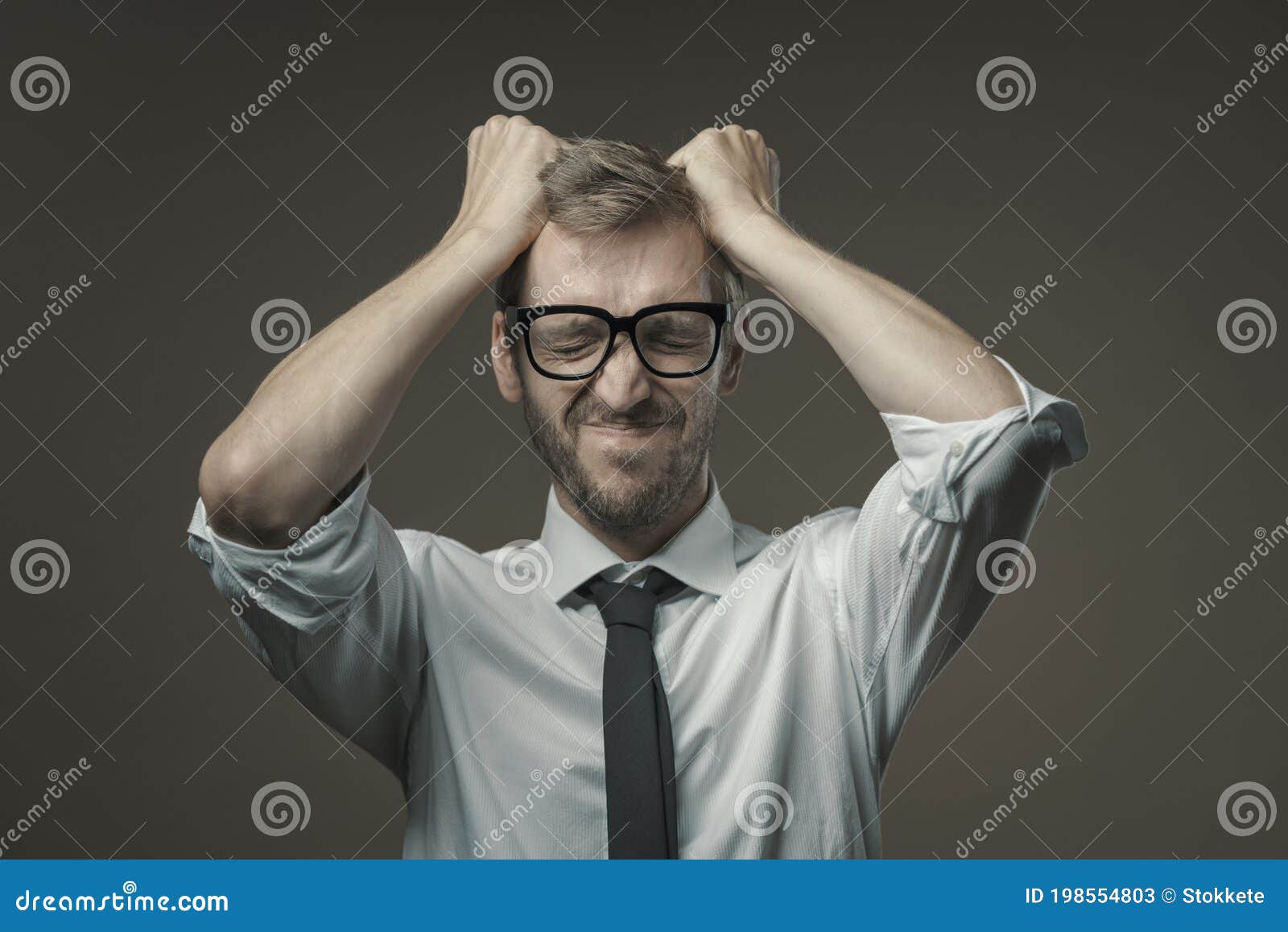Panicked Disappointed Businessman with Head in Hands Stock Image ...