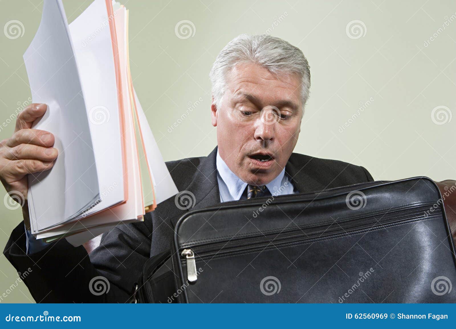 Panicked Man Looking in Briefcase Stock Image - Image of caucasian ...