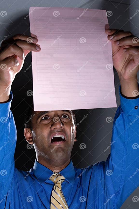 Panicked Man Looking at Form Stock Image - Image of people, arms: 62561267