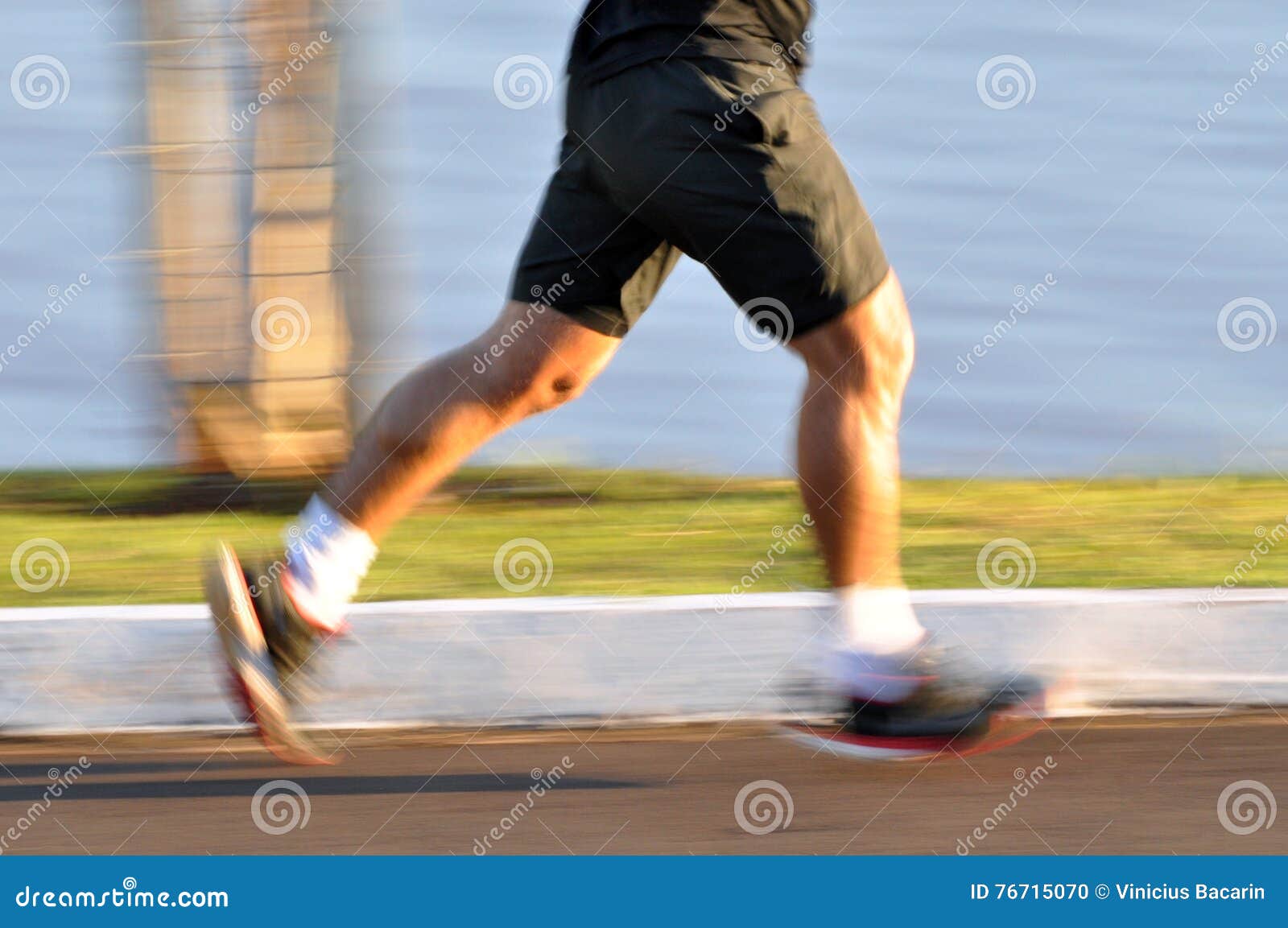 Panning Shot of a Man Running Stock Photo - Image of male, lake: 76715070