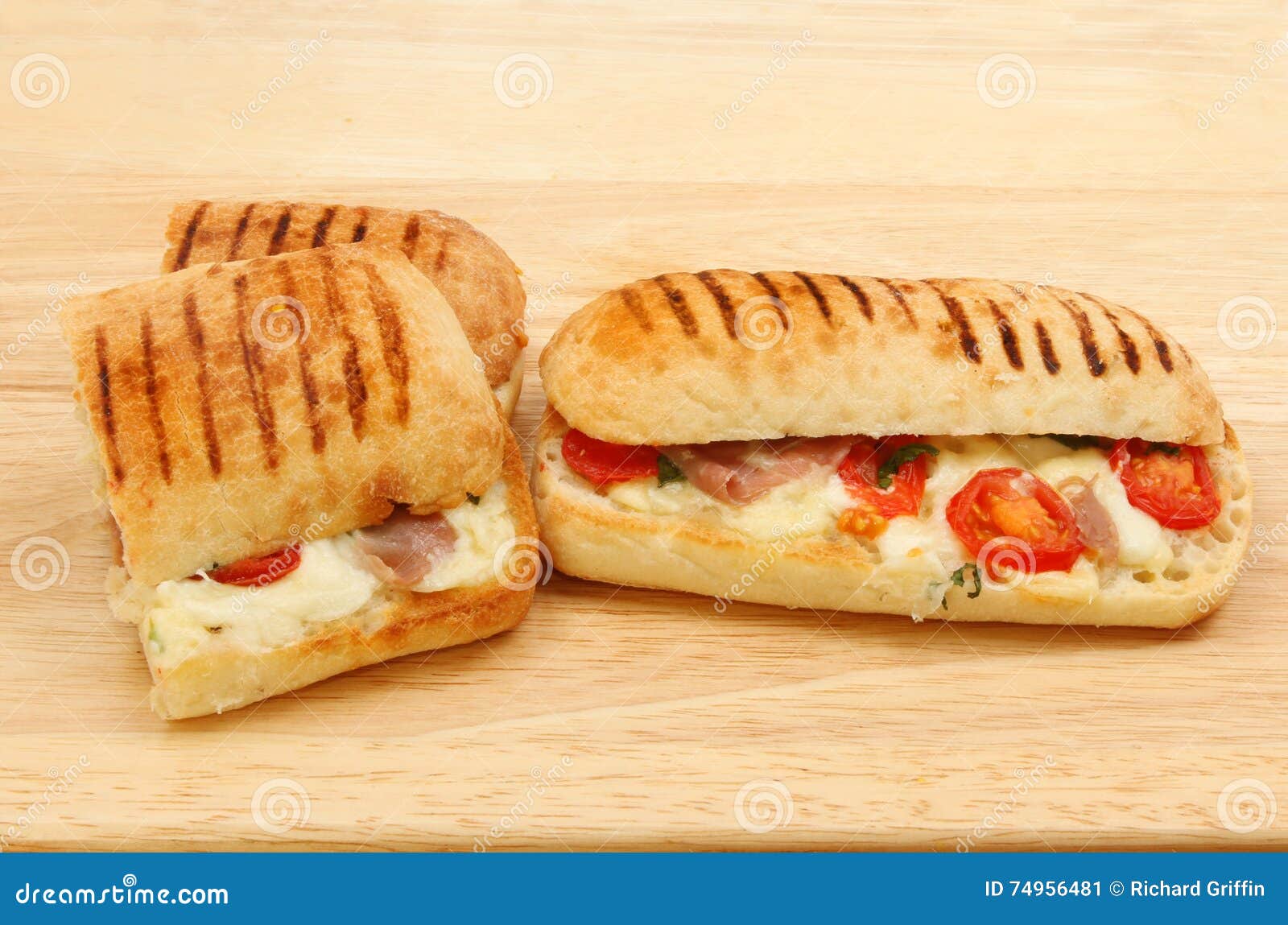Pannini on wood stock image. Image of board, mozzarella - 74956481