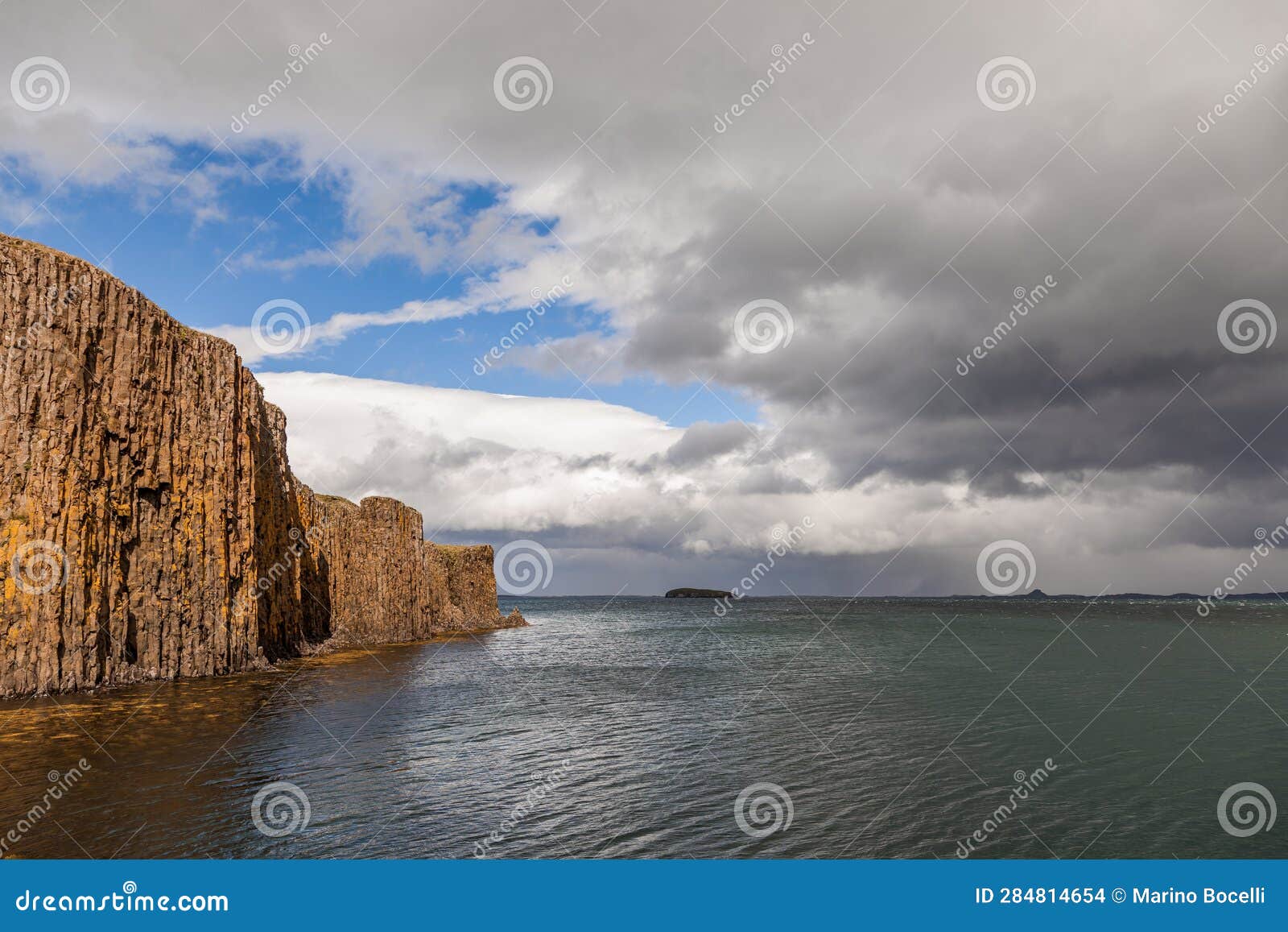 Panorama of a Basalt Cliff Overhanging the Sea in Iceland Stock Photo ...