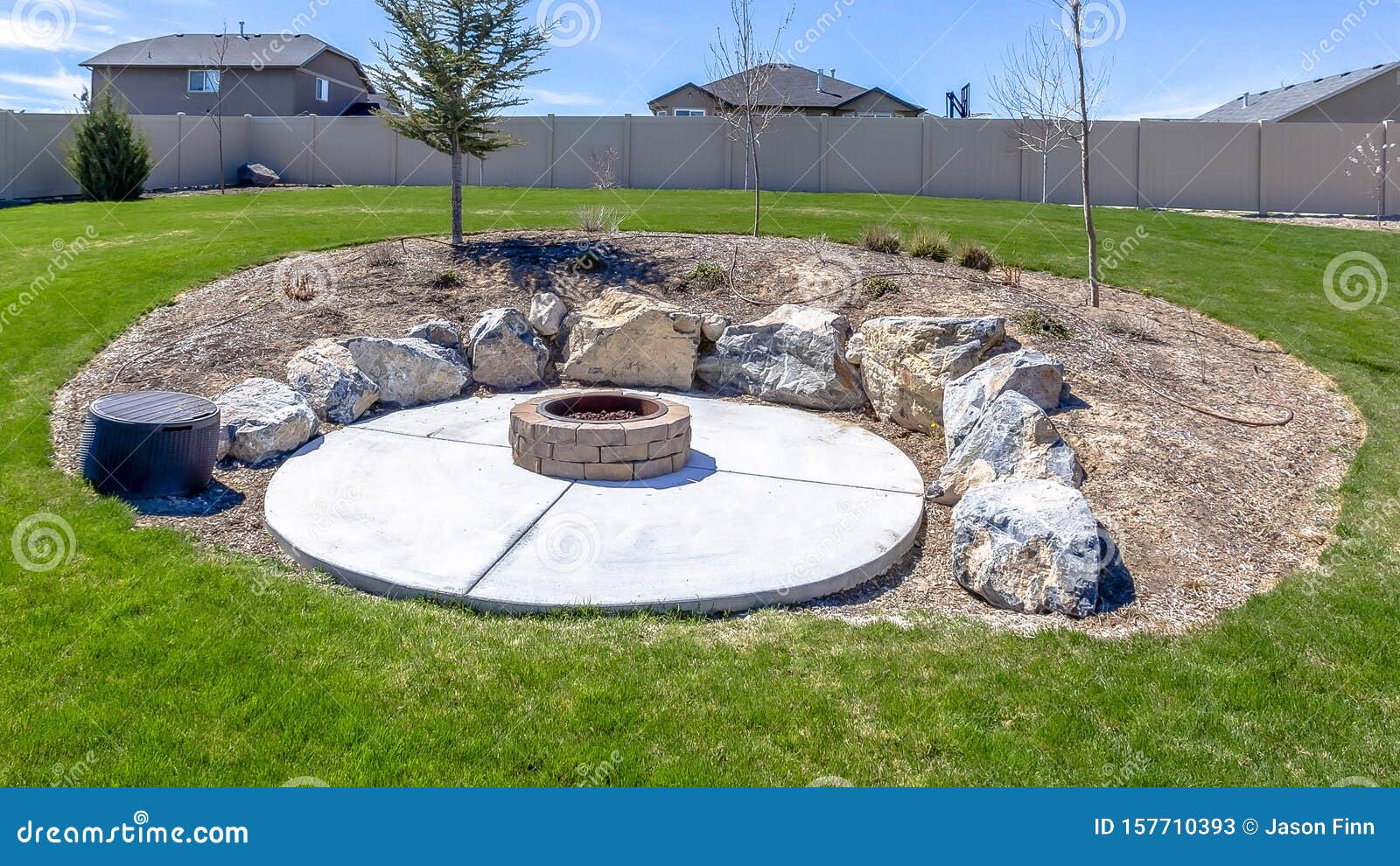 Panorama Frame Circular Fire Pit Surrounded by Rocks in the Middle of ...