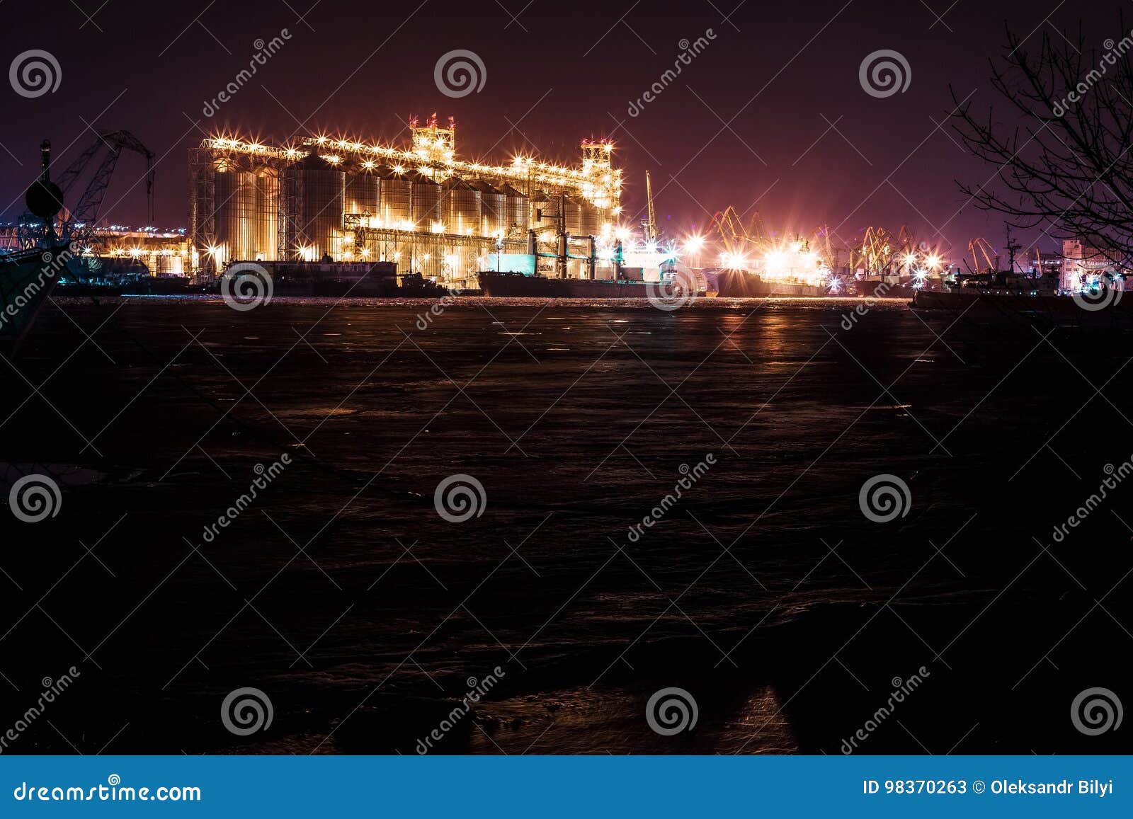 Panorama Image of the Illuminated Cargo Port at Night, Cargo Ships and ...