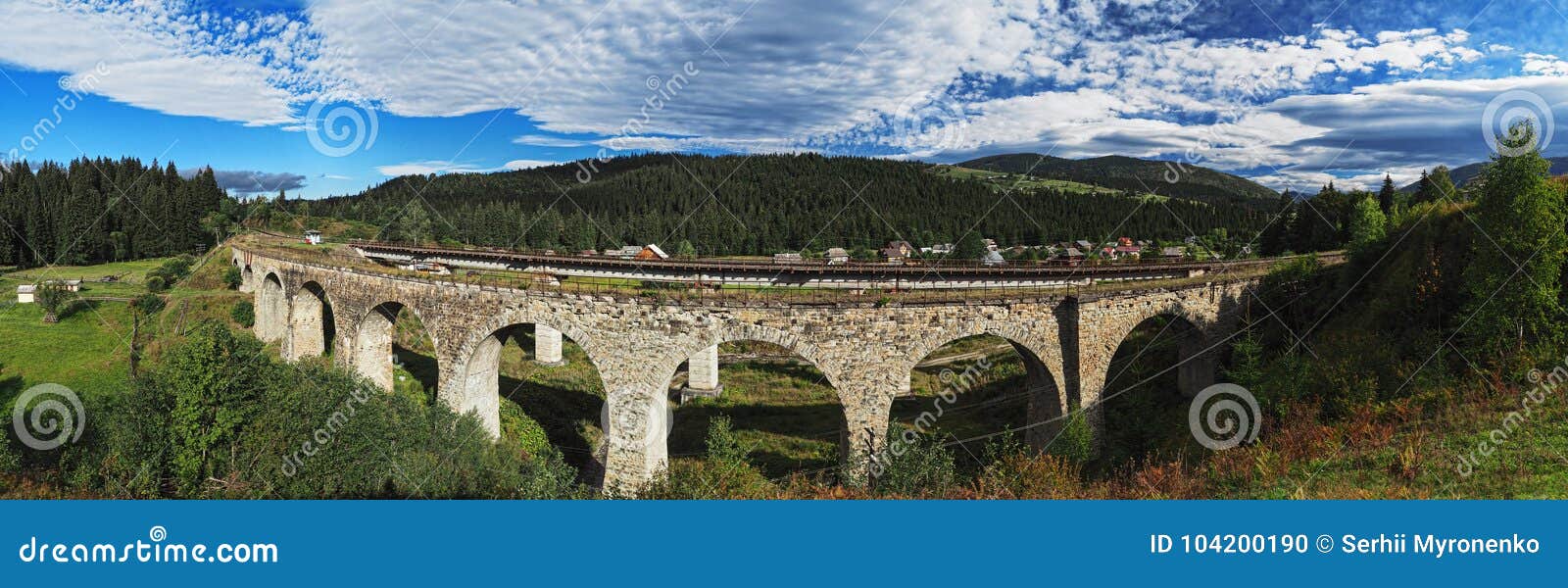 Panorama of the Old Stone Austrian Bridge through the River at T Stock ...