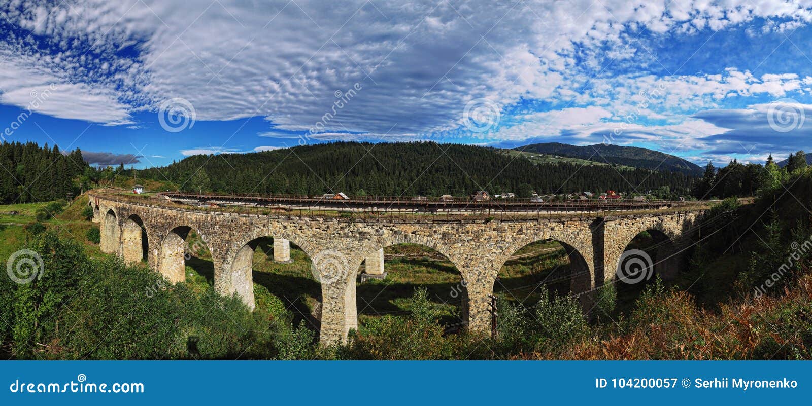 Panorama of the Old Stone Austrian Bridge through the River at T Stock ...