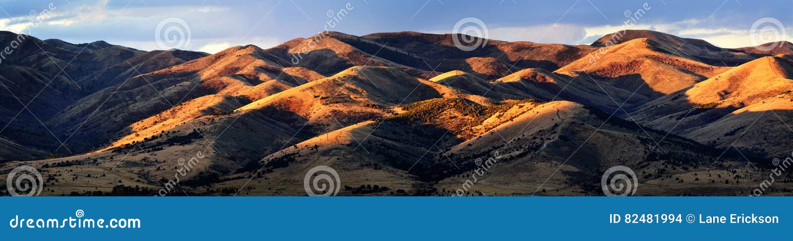 Panorama Scene of Mountains with Golden Sunlight on Them Stock Photo ...