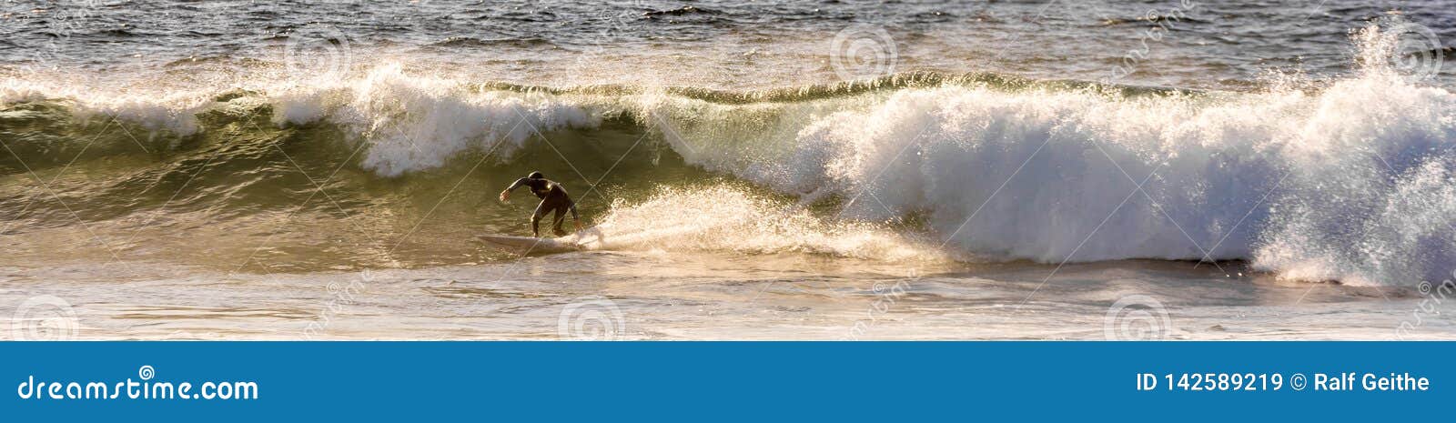 Panorama of a Surfer Who Skillfully Rides a Wild Wave Stock Image ...